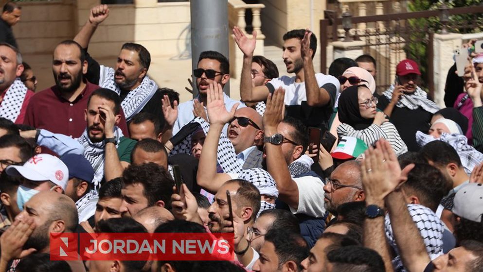 Day 12: Jordanians gather at the Israeli Embassy in solidarity...