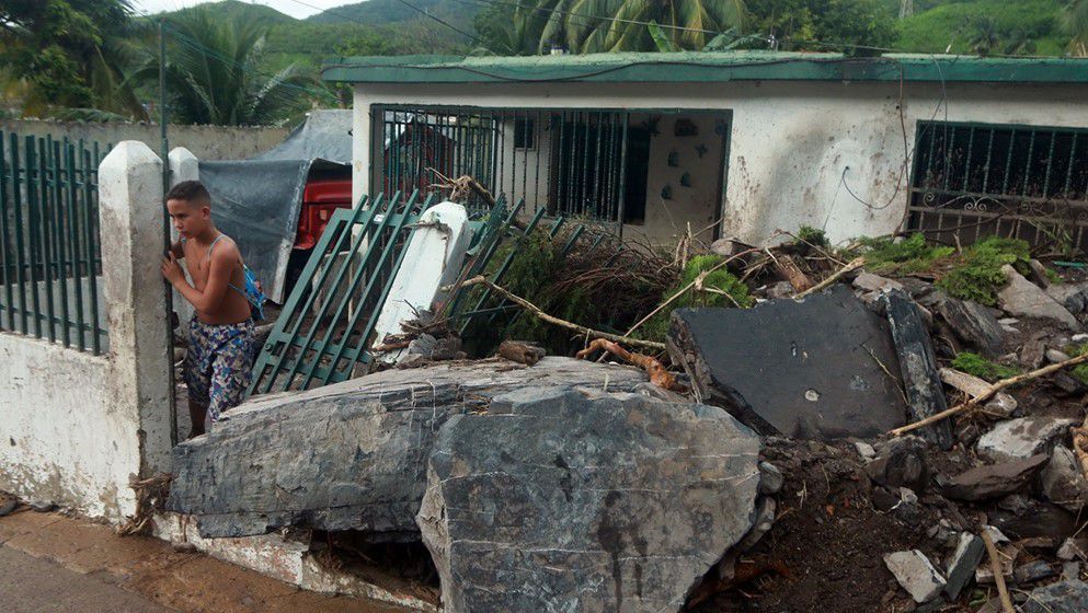 Landslides, floods kill seven in Venezuela...