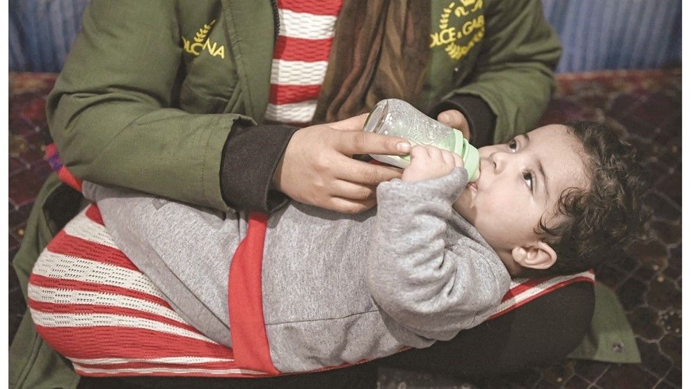 Afghan baby lost in US airlift chaos reunited with family...