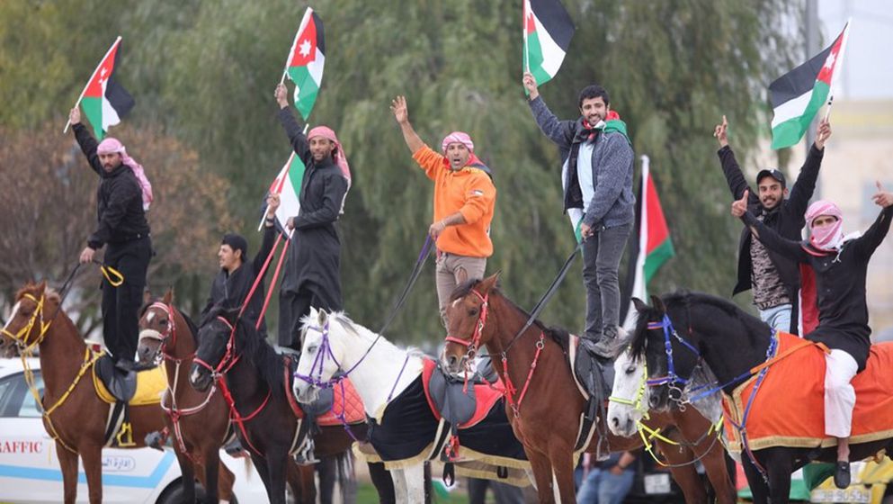 Jordanians await the national football team's return at QAIA...