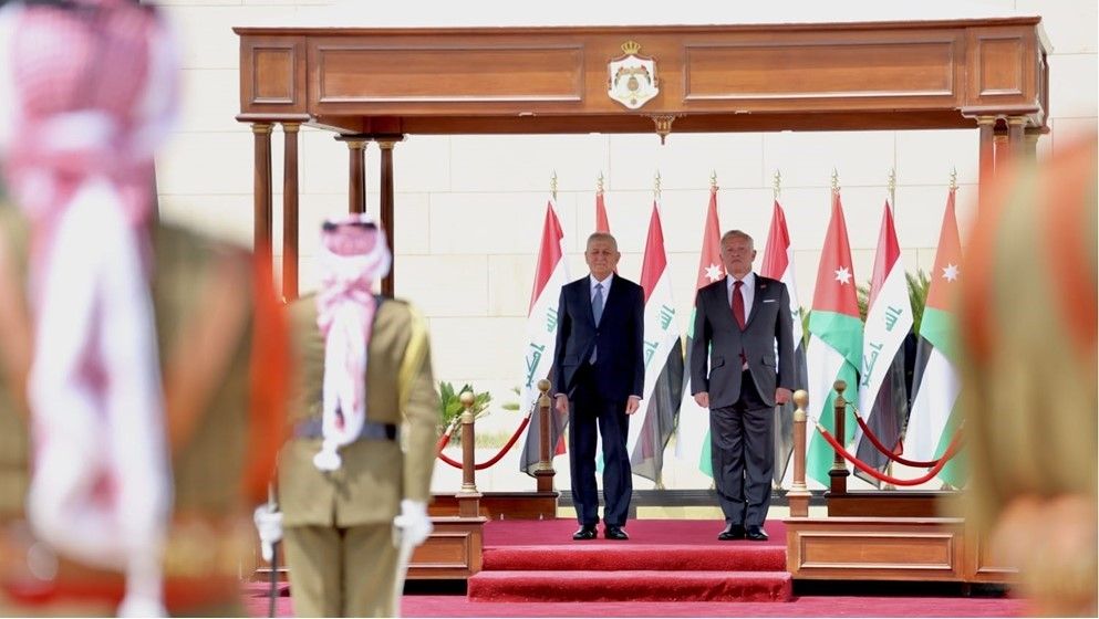 King receives Iraq president...