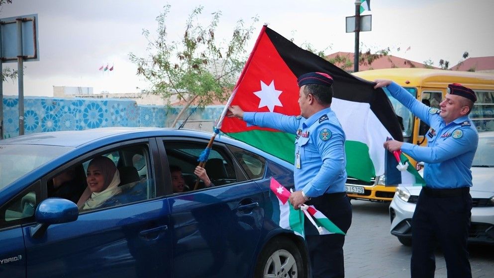 Public Security Officers Distribute Flags and Organize Communi...