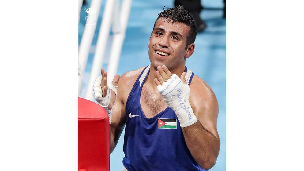 Boxer Hussein Ishaish qualifies for Olympics quarterfinals...