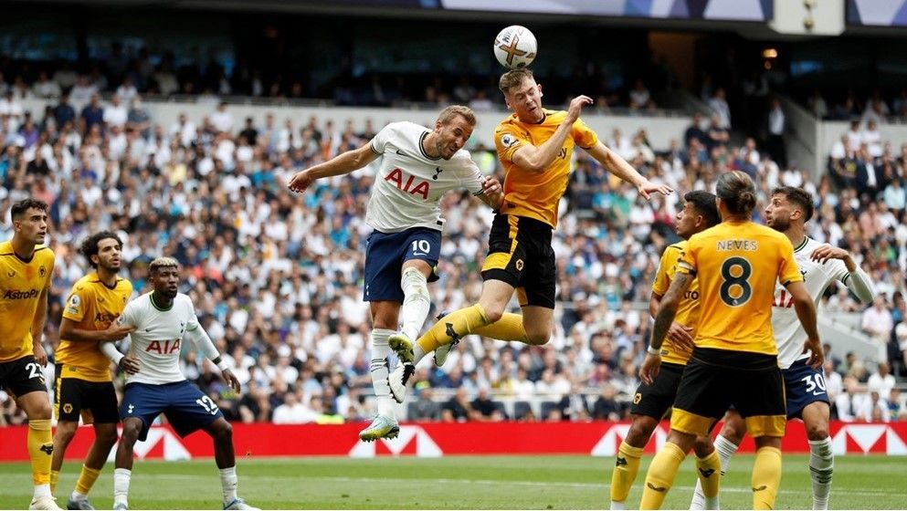 Tottenham’s Kane landmark goal fires Spurs to victory over Wol...