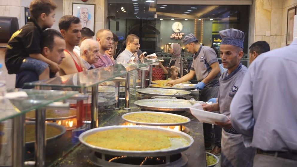 In pictures: Jordanians pass the sweets to mark Tawjihi result...