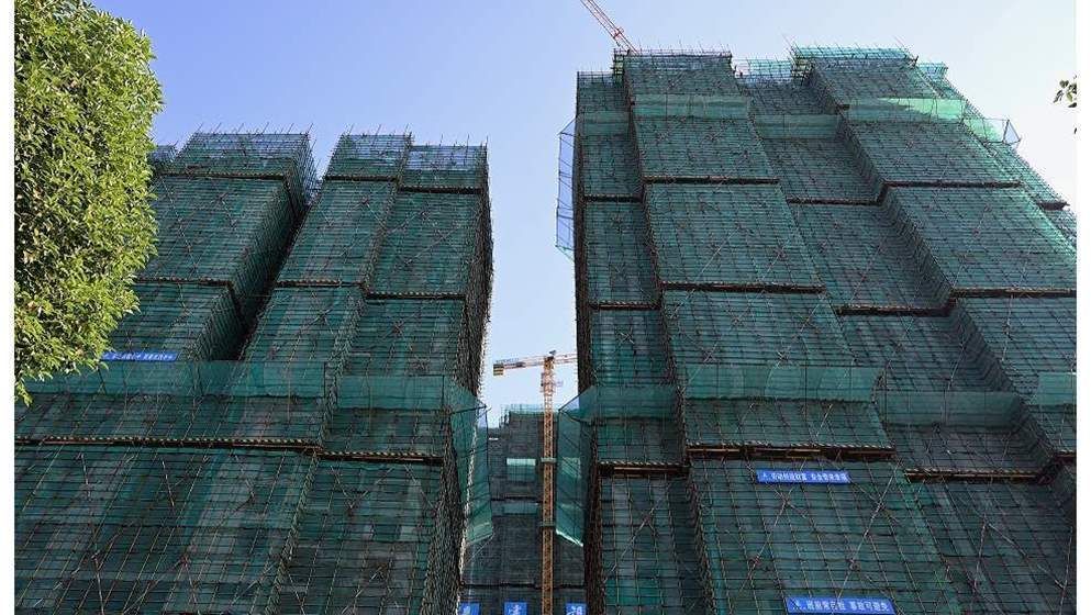 Protests as Chinese property giant Evergrande faces 'tremendou...