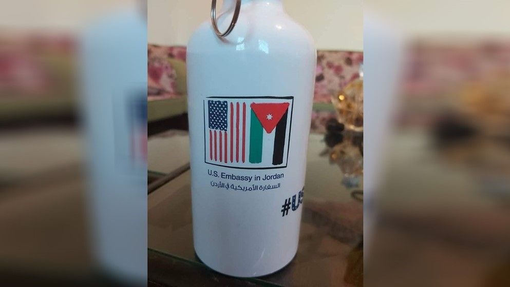 Bottles with US Embassy logo sold in Friday market...