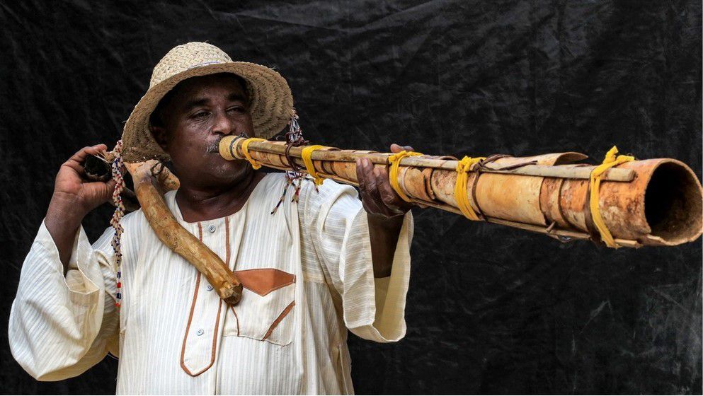 Sudan traditional wind instrument trumpets harvest time...